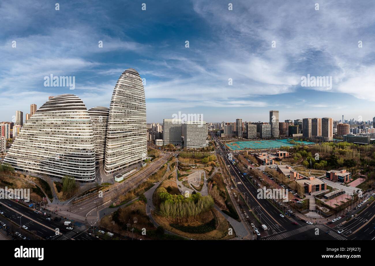 Aerial view of WangJing Soho at sunset, a famous landmark building in ...
