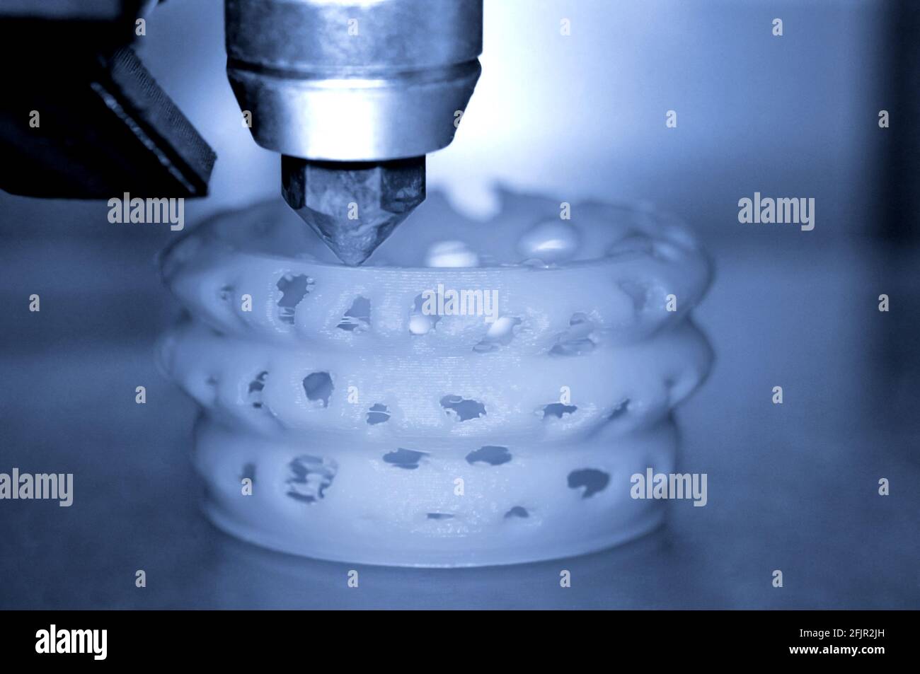 3d printer printing objects blue gray color form closeup Stock Photo ...