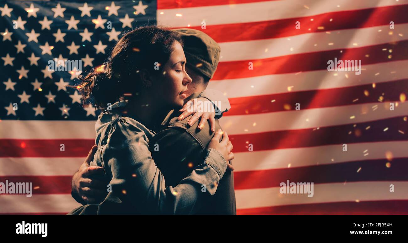 Independence day, memorial Day. A woman embraces a soldier. Couple on ...