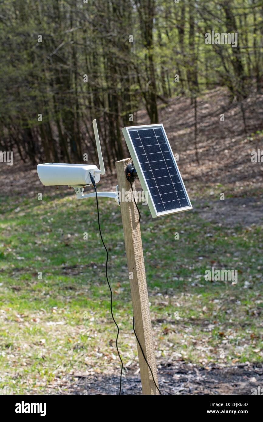 Surveillance camera with solar panel. Solar powered CCTV camera in ...