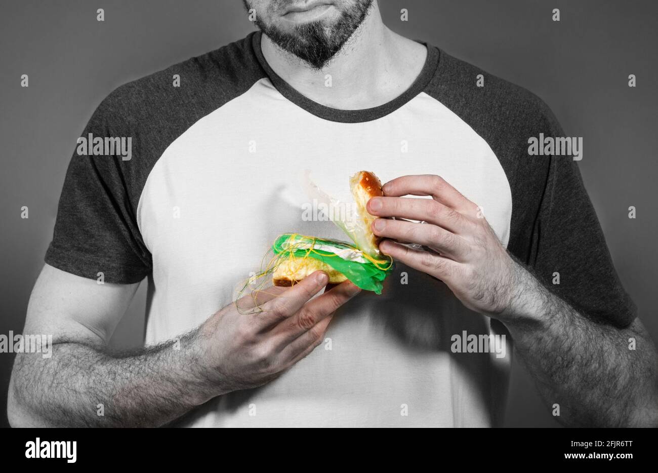 Environmental pollution and food industry. Portrait of a man with a ...