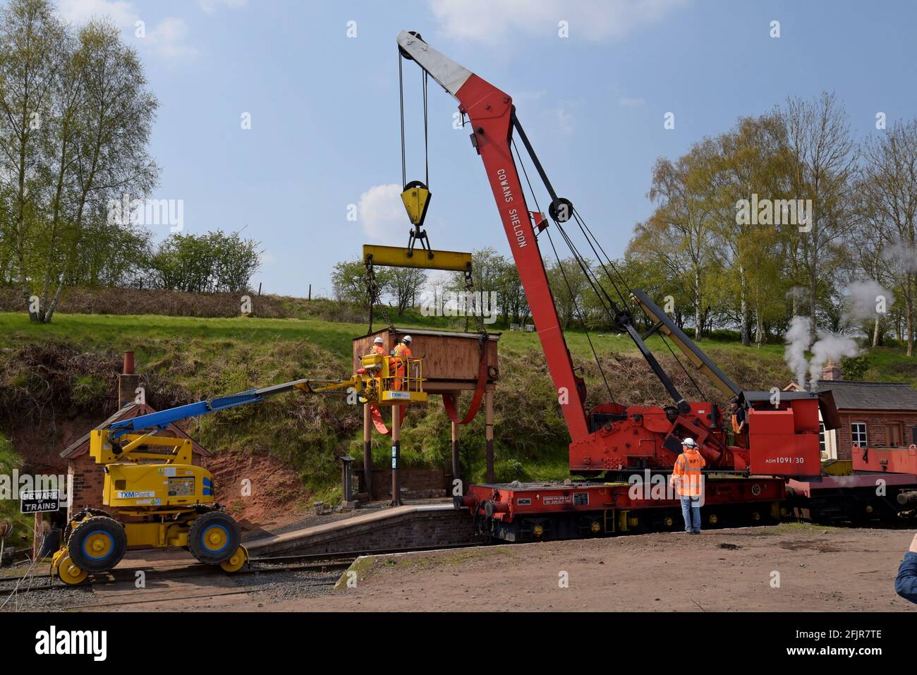 Severn Valley Railway volunteers using a cherry picker & Cowans Sheldon ...