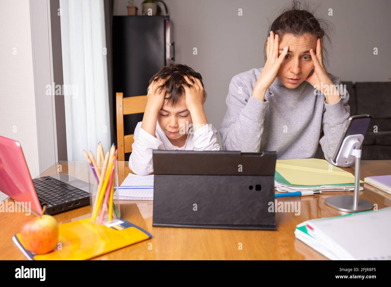 boy doing his homework while lock down, studying remotely Stock Photo ...