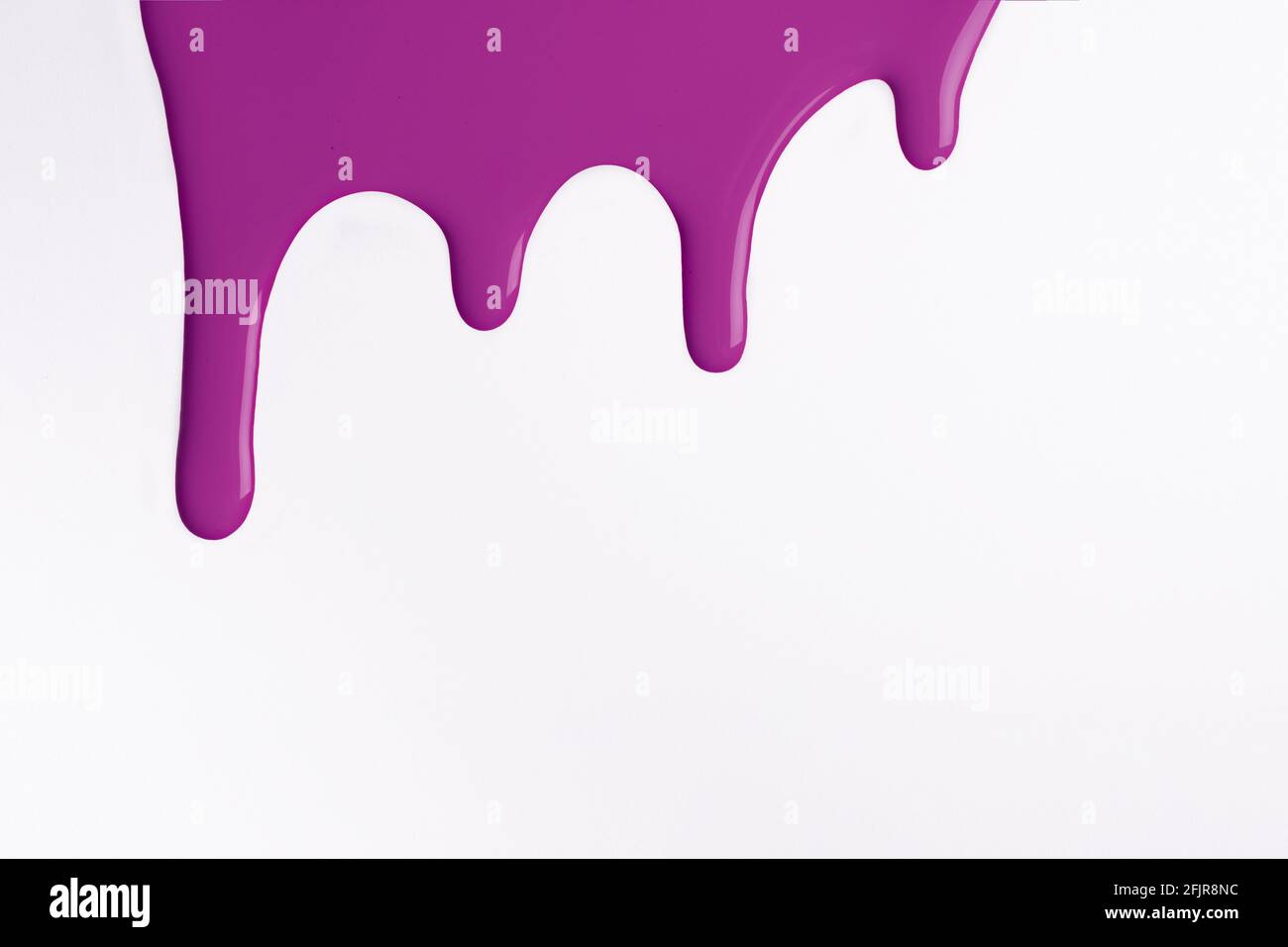 Light purple liquid drops of paint color flow down on isolated white ...