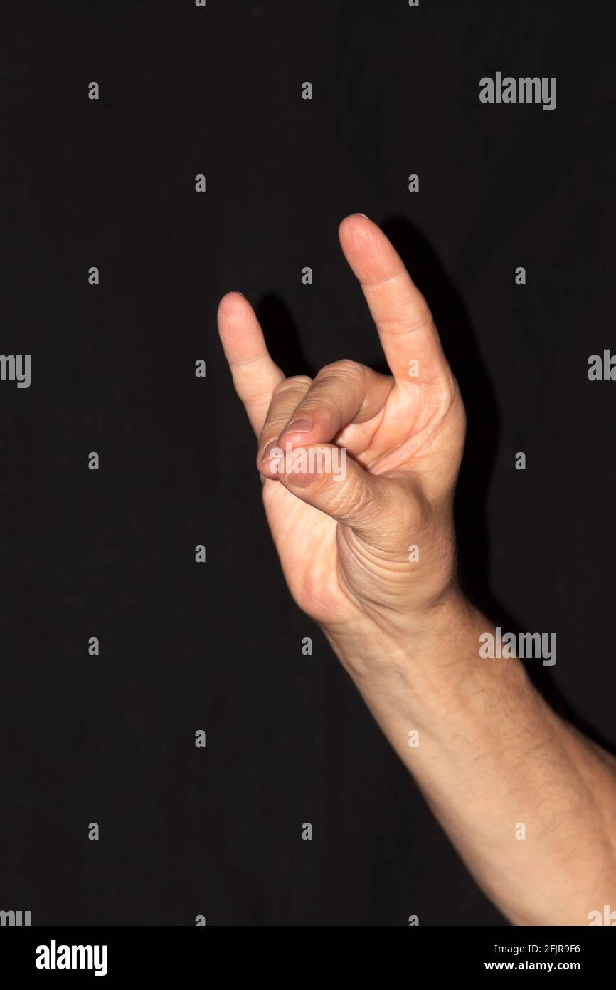 Muslim hand sign Stock Photo - Alamy