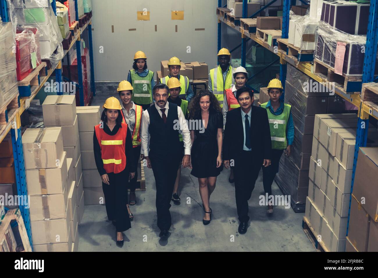 Many people , workers and manger work in warehouse or storehouse ...