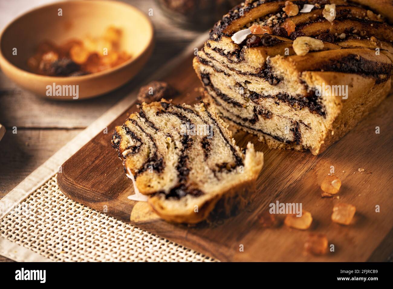 Traditional Polish vegan babka cake with chocolate on wooden background ...
