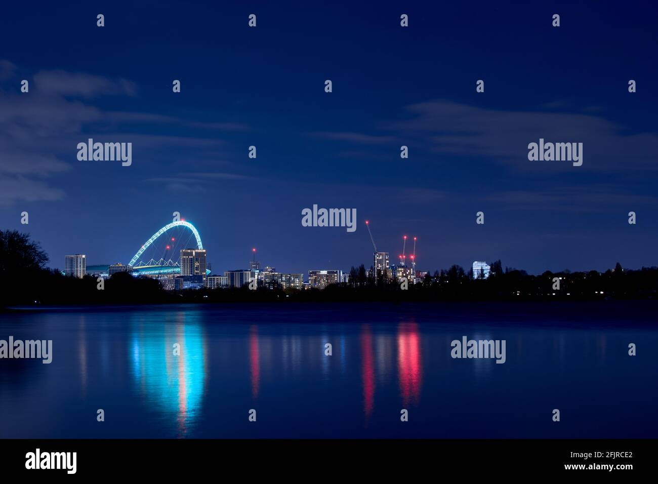 A general view of Wembley stadium with the arch lit up at night, London ...