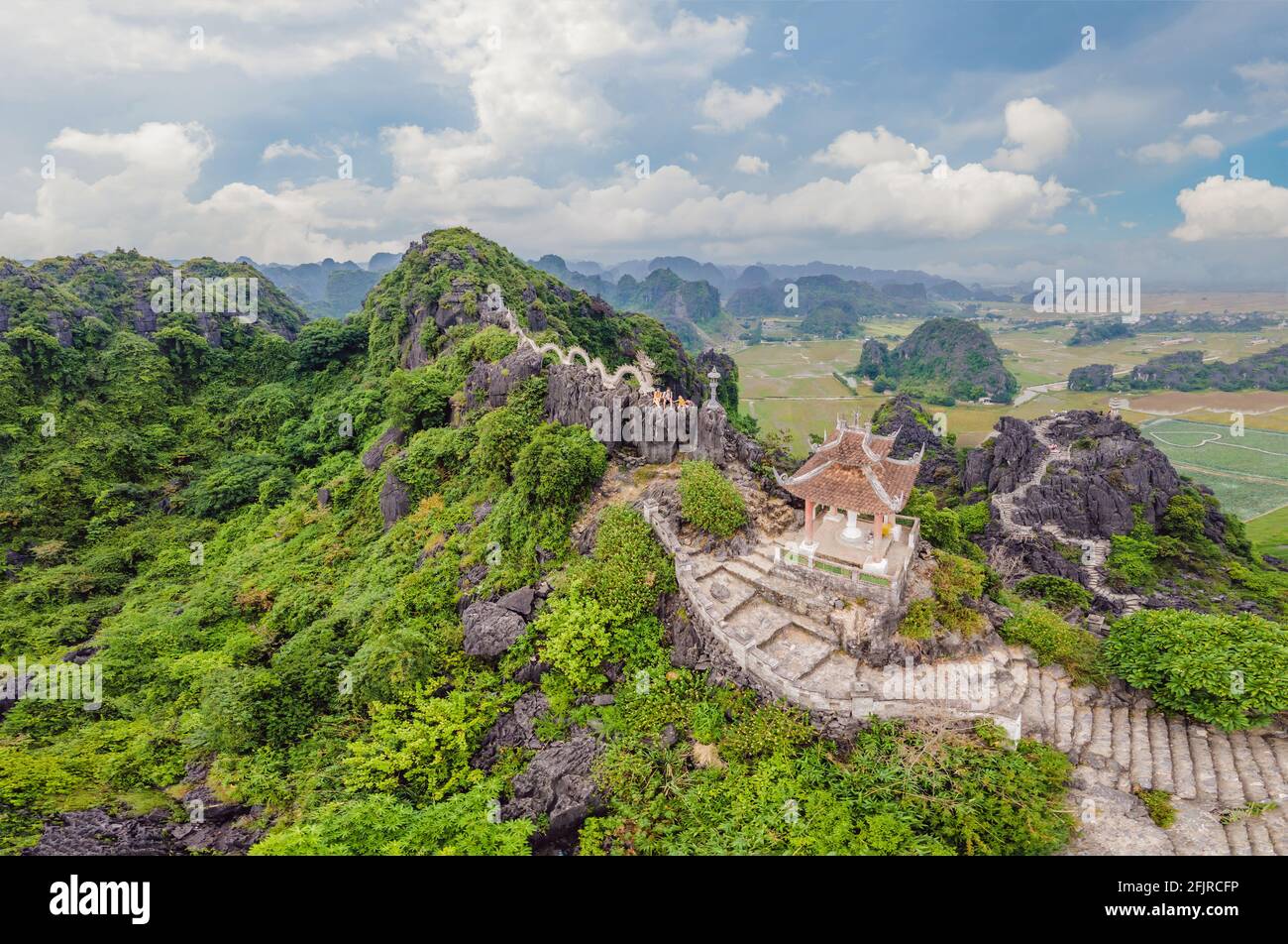 Family of tourists on the background of Amazing huge dragon statue at ...