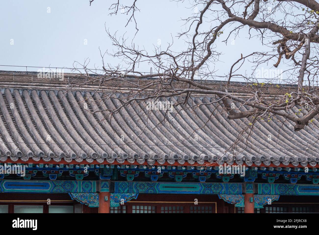 The ancient buildings with red wall, yellow or gray tile roof, door ...