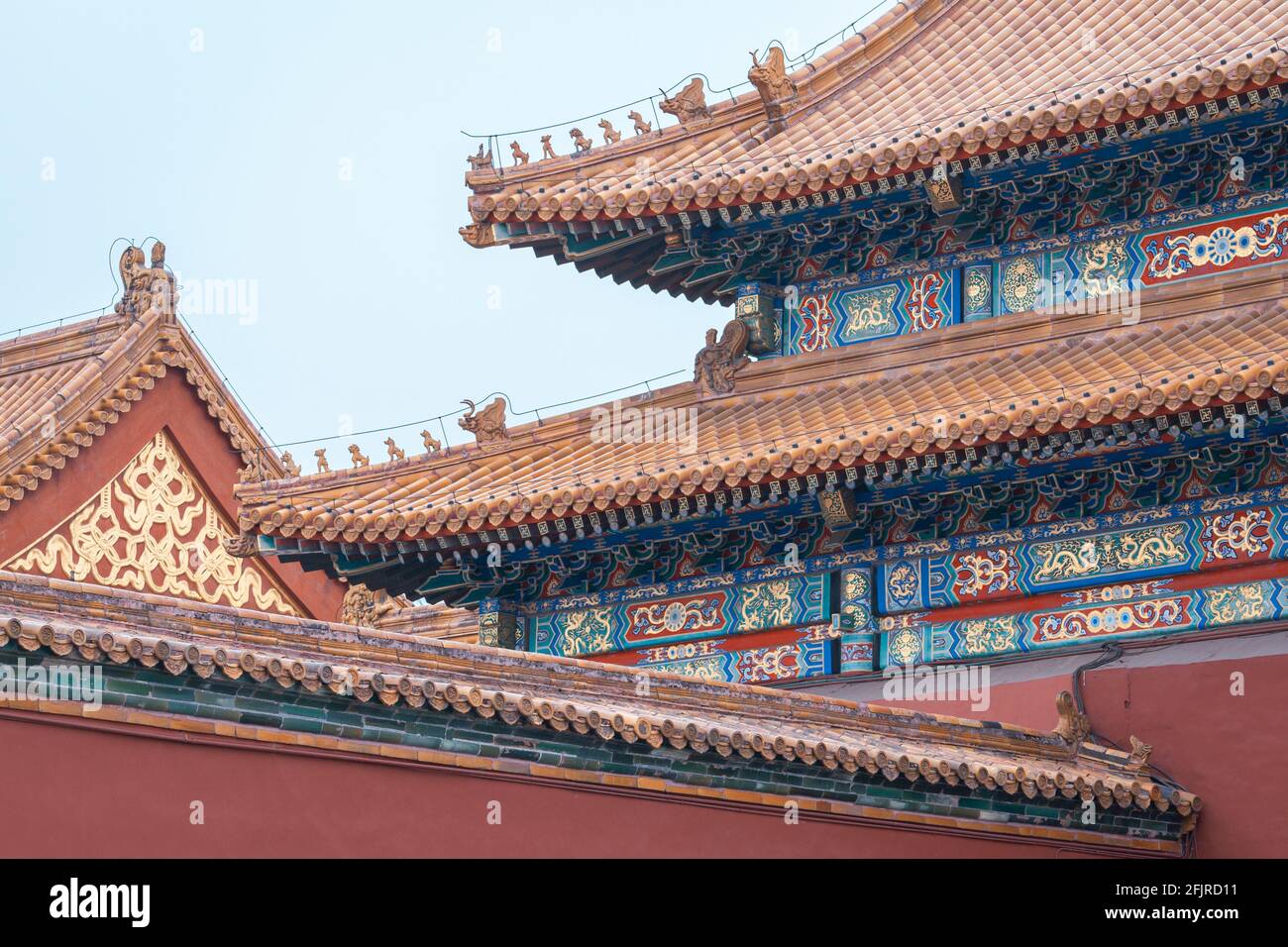The ancient buildings with red wall, yellow or gray tile roof, door ...