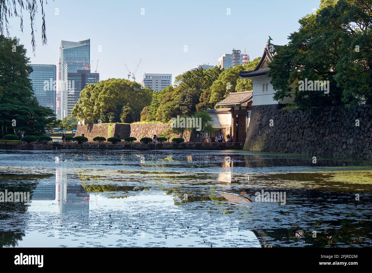 The view of Kokyo Otemon (East) Gate reflecting in the water of ...