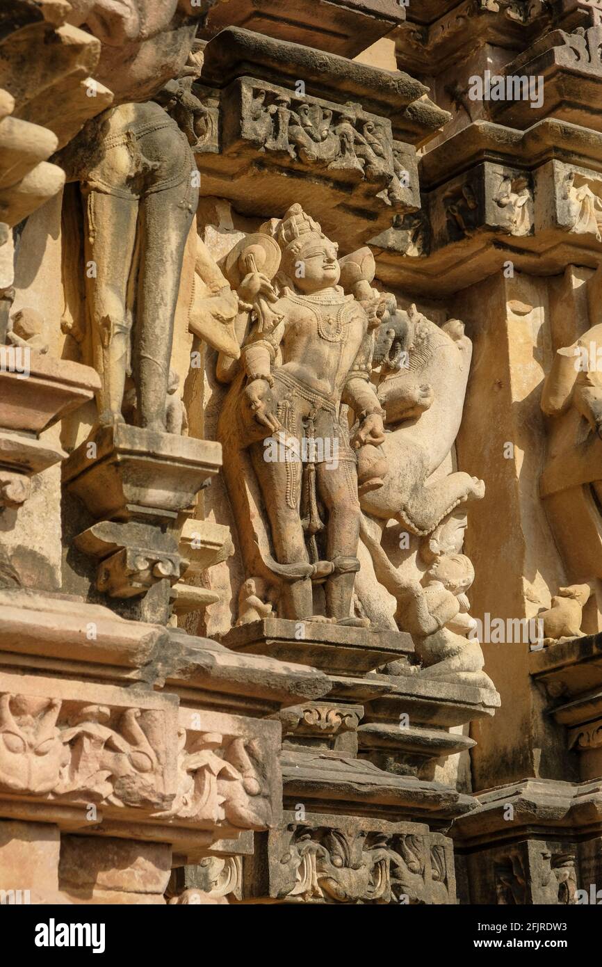 Detail of the Vamana Temple in Khajuraho, Madhya Pradesh, India. Forms ...