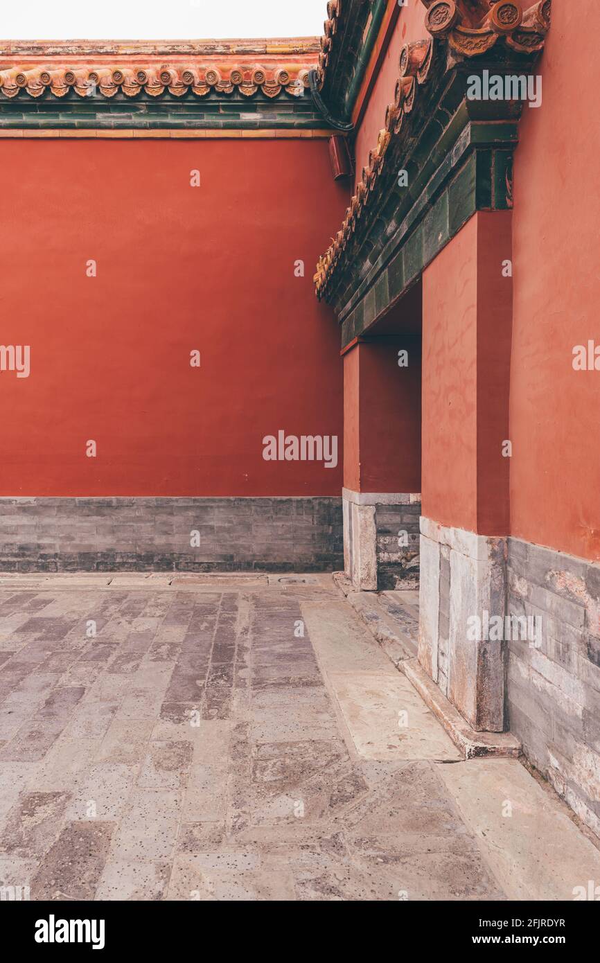 The ancient buildings with red wall, yellow or gray tile roof, door ...
