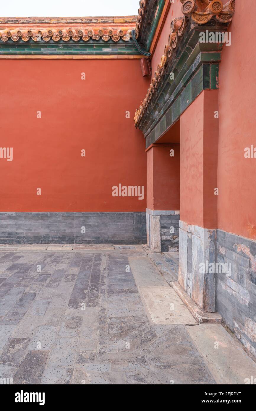 The ancient buildings with red wall, yellow or gray tile roof, door ...