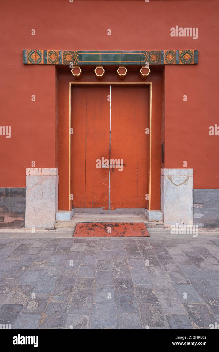 The ancient buildings with red wall, yellow or gray tile roof, door ...