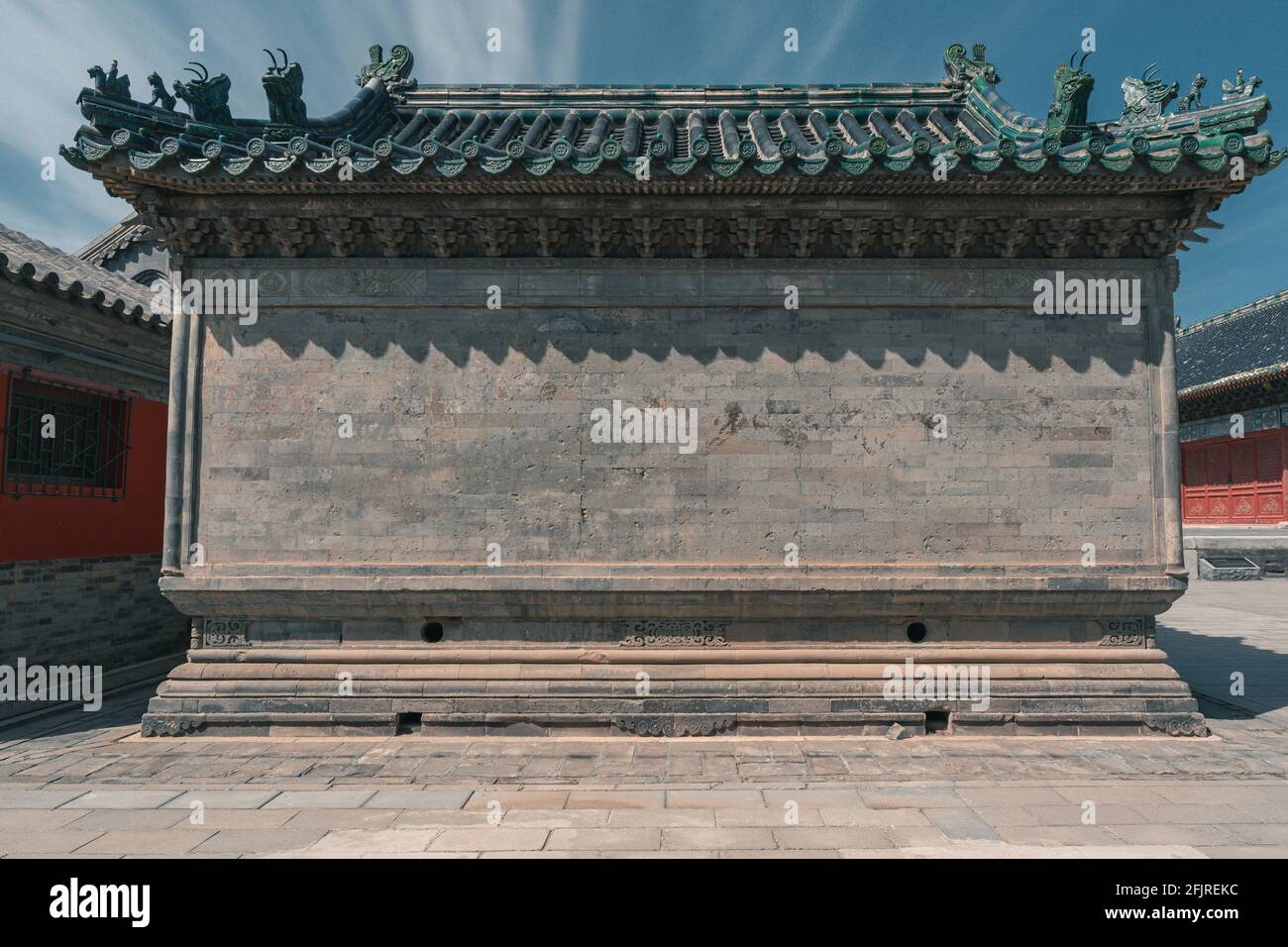 Ancient buildings with gray brick wall and Chinese tile roof in the ...