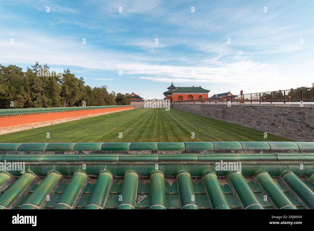 Ancient buildings with red wall and corridor in the Park of Temple of ...