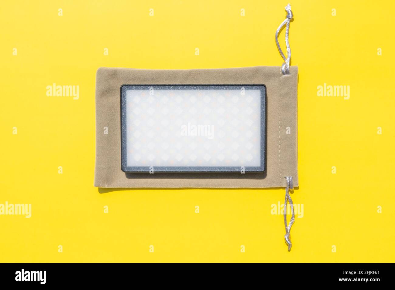 Led screen portable macro texture isolated on yellow background. Art ...