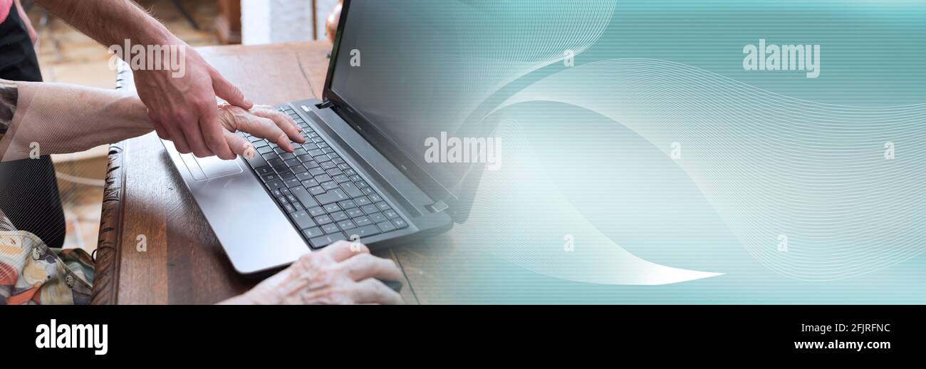 Old woman learning to use a laptop; panoramic banner Stock Photo - Alamy
