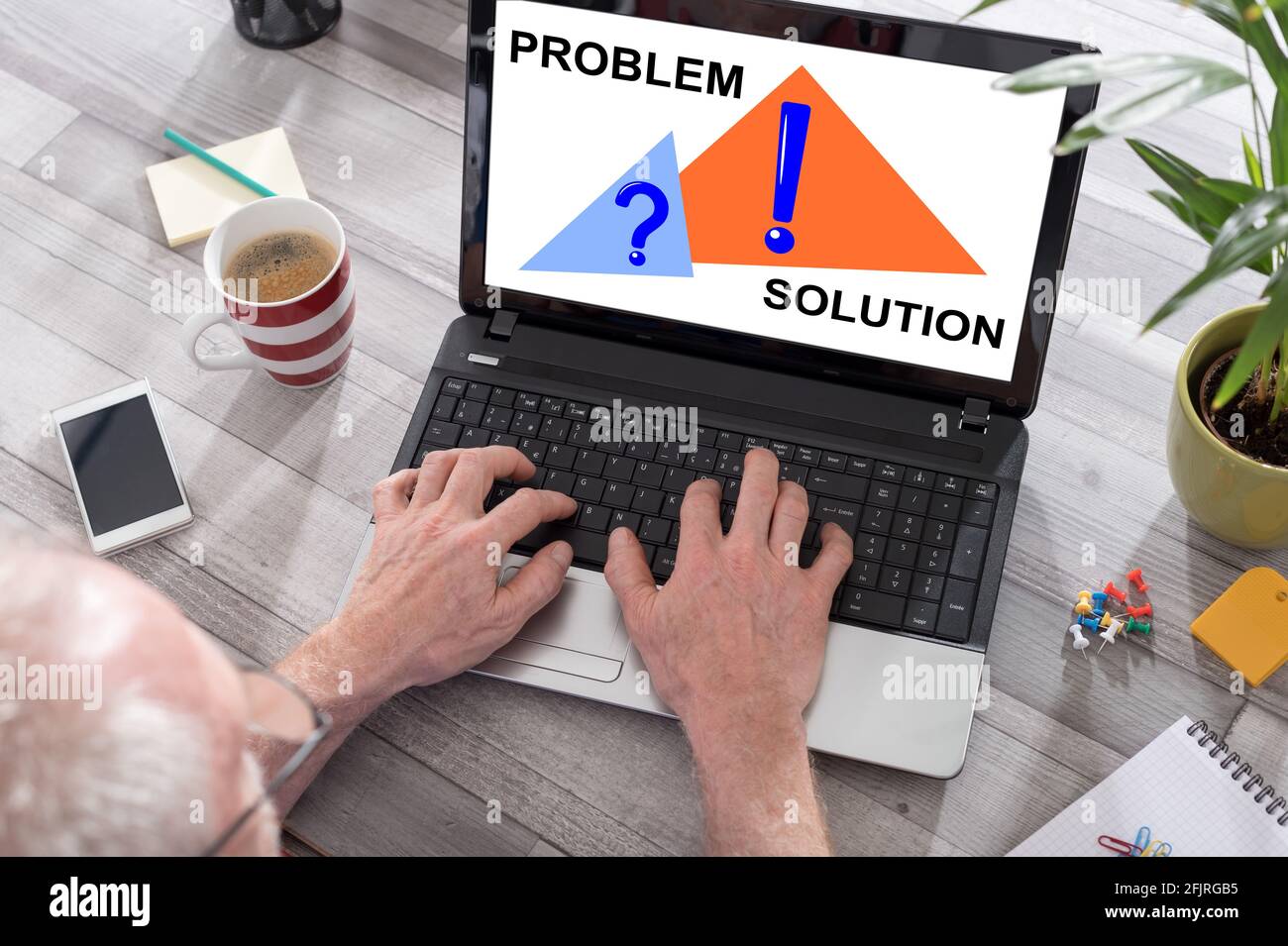 Problem and solution concept shown on a laptop used by a man Stock ...
