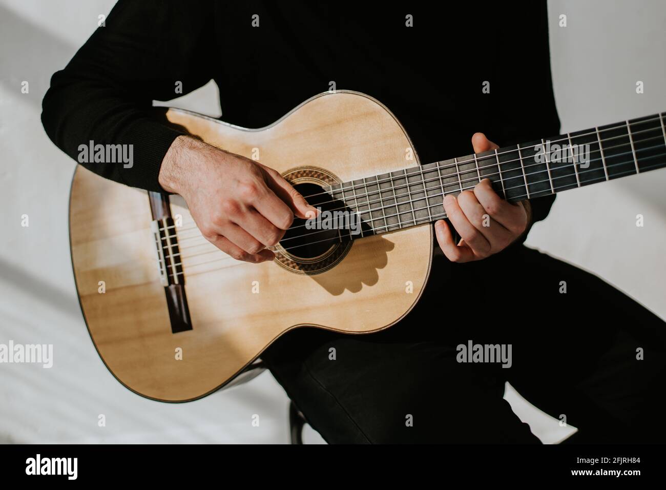 photo of man playing classical guitar Stock Photo - Alamy