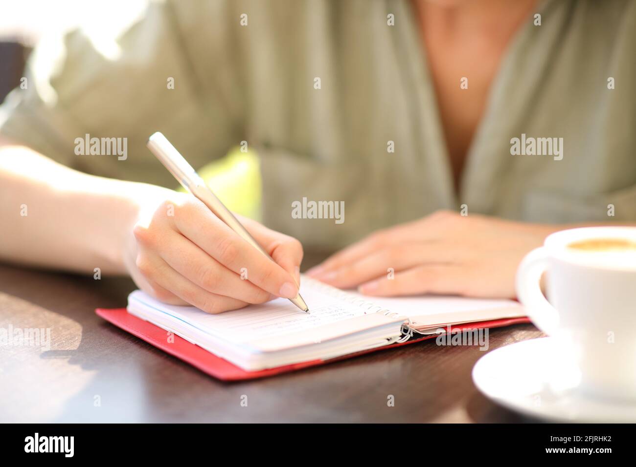 Woman writing notes hi-res stock photography and images - Alamy