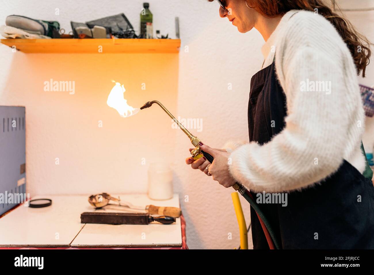 Woman blowtorch hi-res stock photography and images - Alamy