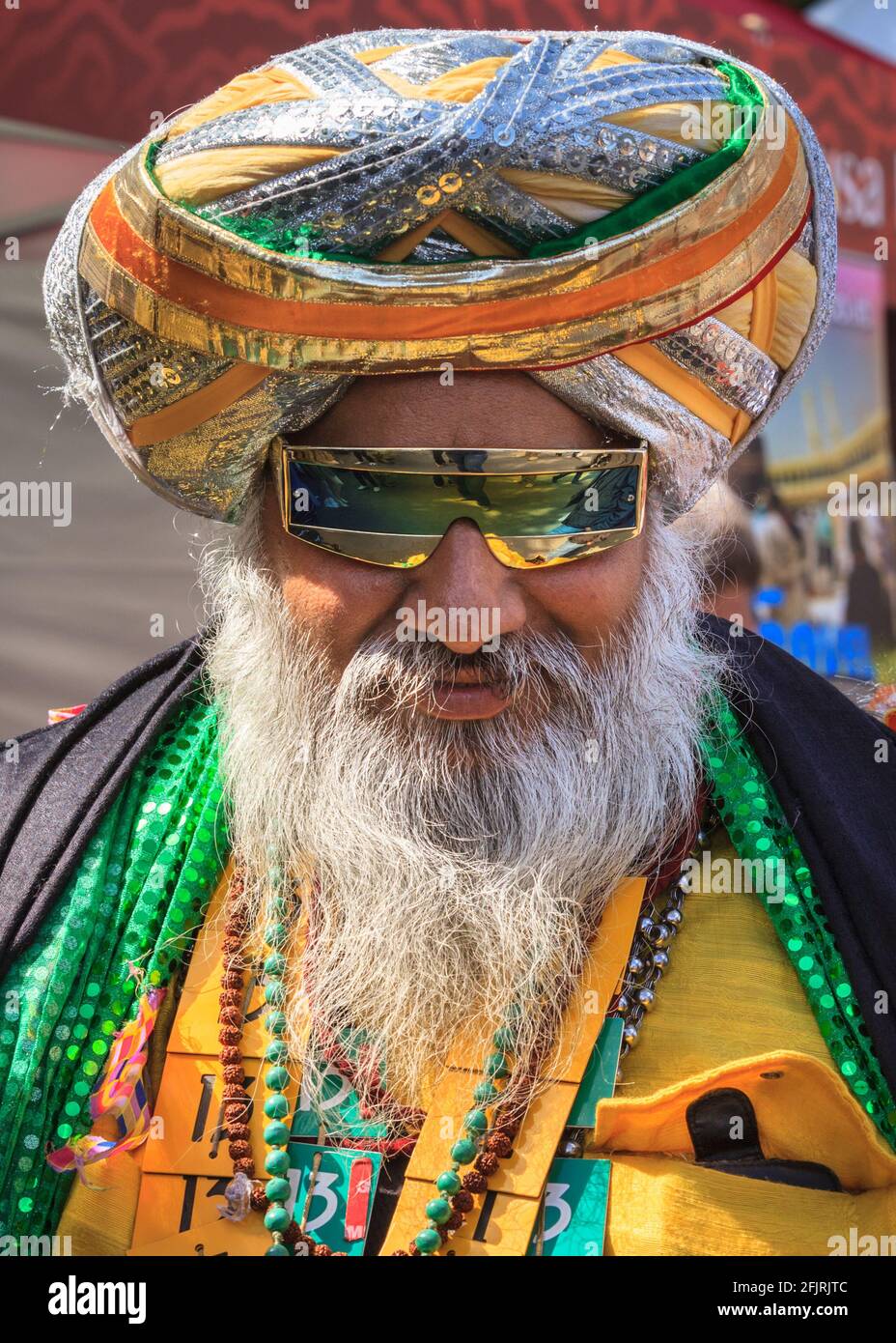 Sikh Punjabi man Kala Kala in colourful Dastar turban and vibrant ...
