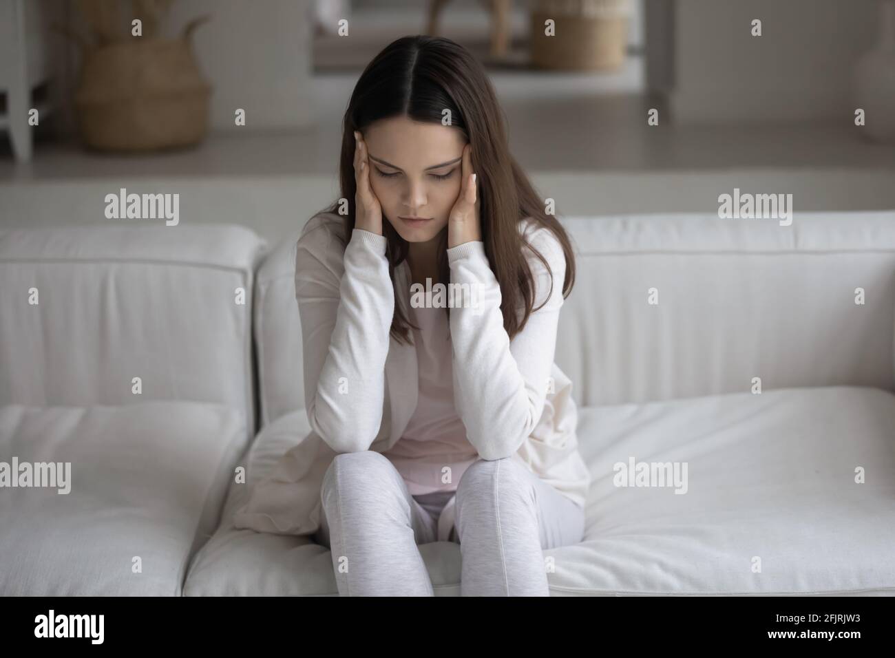 Depressed teen girl trying to cope with stress, anxiety Stock Photo - Alamy