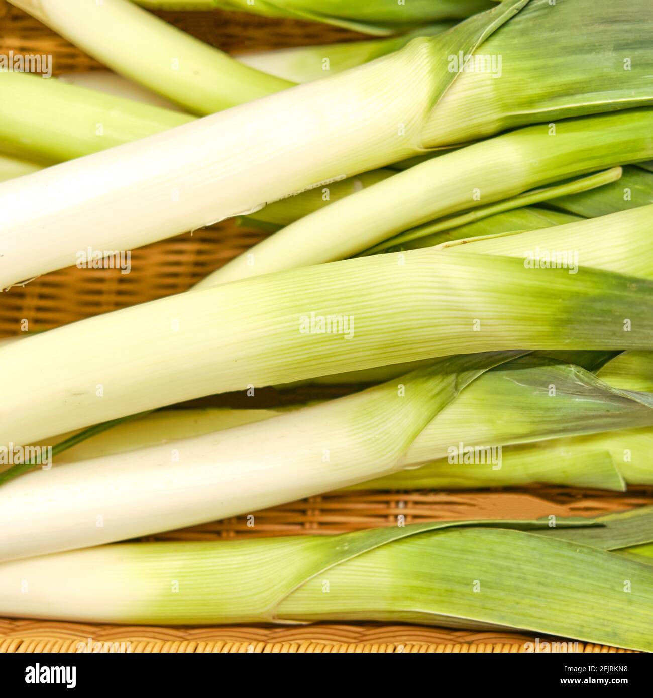 Food background of fresh green leek leaves in the store close-up Stock ...