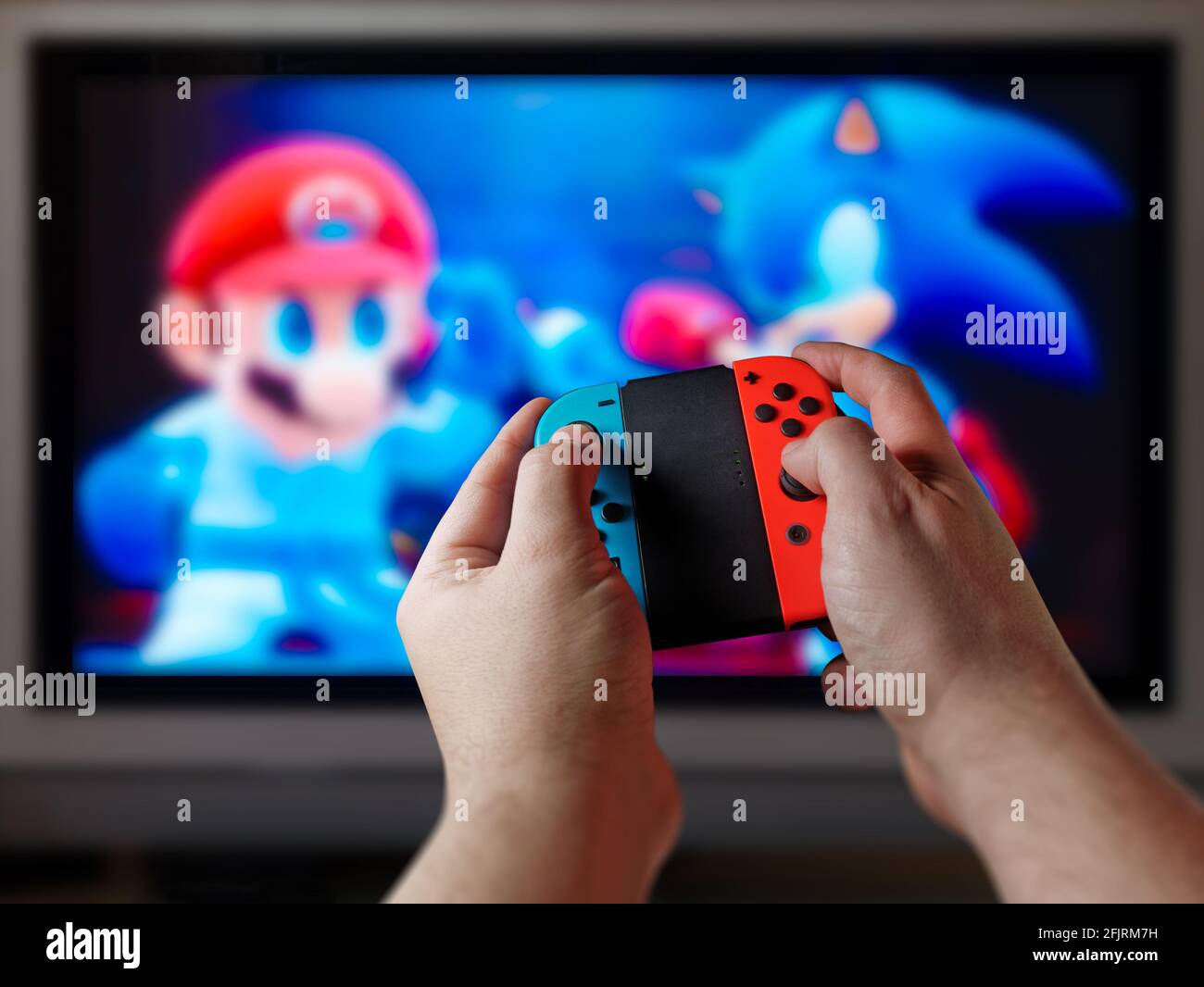 Male gamer hands on console control playing Video game or videogame on ...