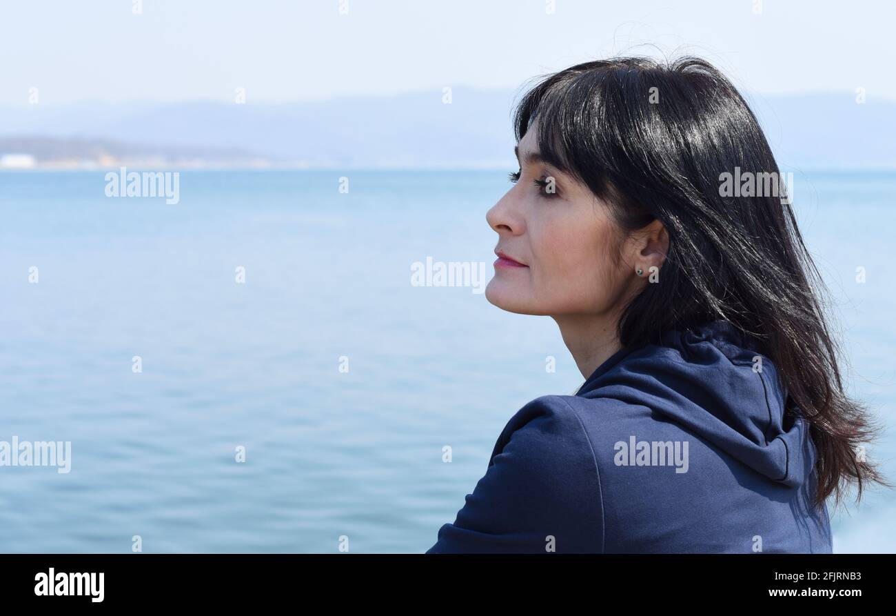 Portrait of 45 y.o. Russian woman against the Japanese sea Stock Photo ...