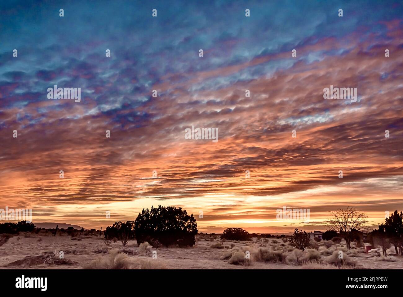 Breathtaking sunset over a field in Santa Fe, New Mexico Stock Photo ...