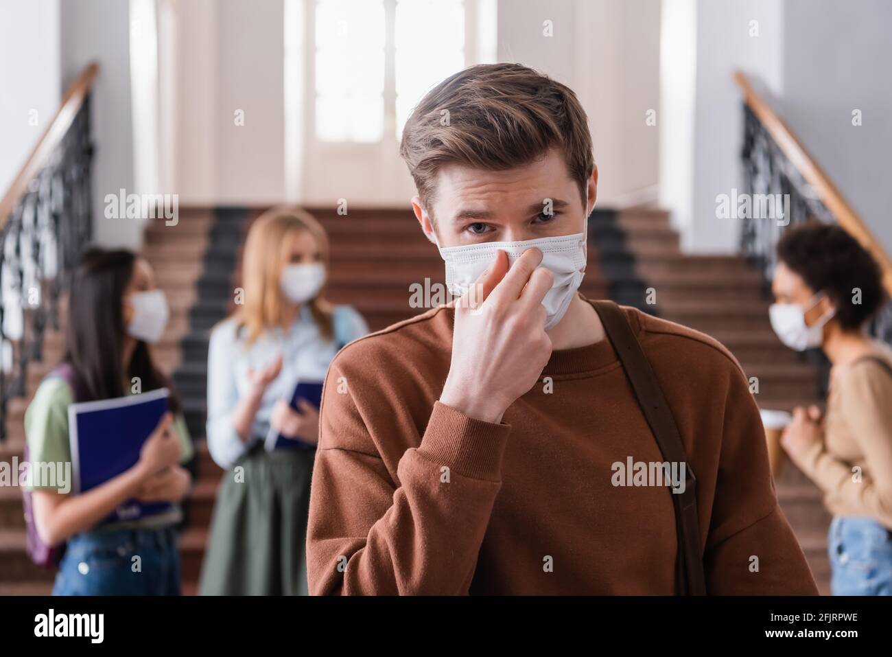 Young women wearing medical masks hi-res stock photography and images ...
