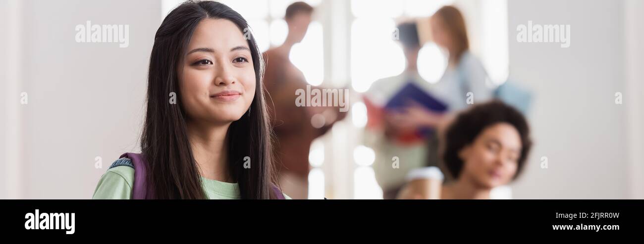 Asian student looking away in university, banner Stock Photo - Alamy