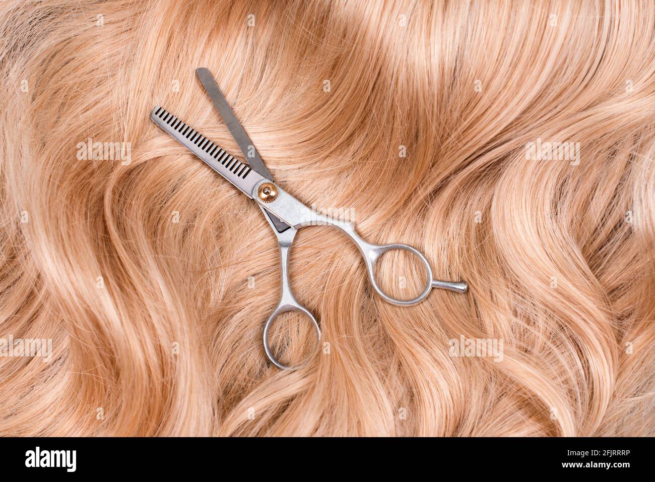 Hairdresser girl wavy hairdo hi-res stock photography and images - Alamy