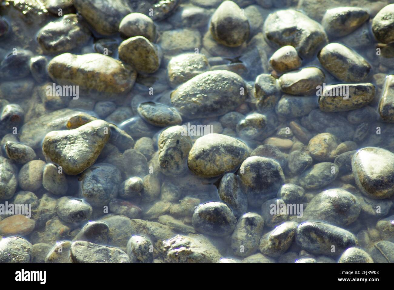 Set of natural stones on the bank of a river. No people Stock Photo - Alamy