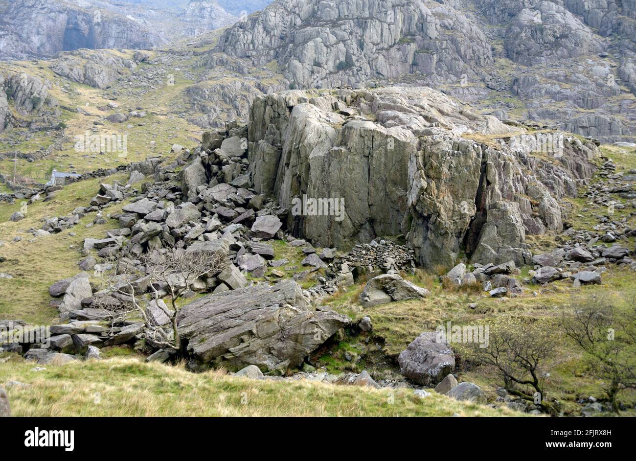 Fallen rocks, on foothills of Snowdon, on Llanberis Pass, Wales Stock ...