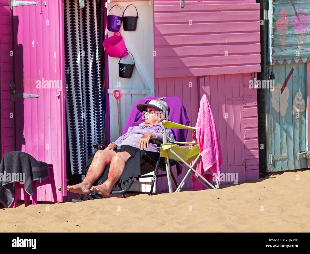 Lady in a beach hut hi-res stock photography and images - Alamy
