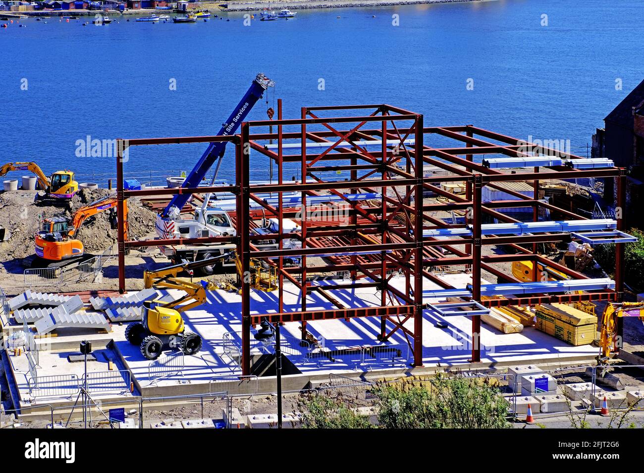 Steel framed 3 storey building being constructed by the riverside Stock ...
