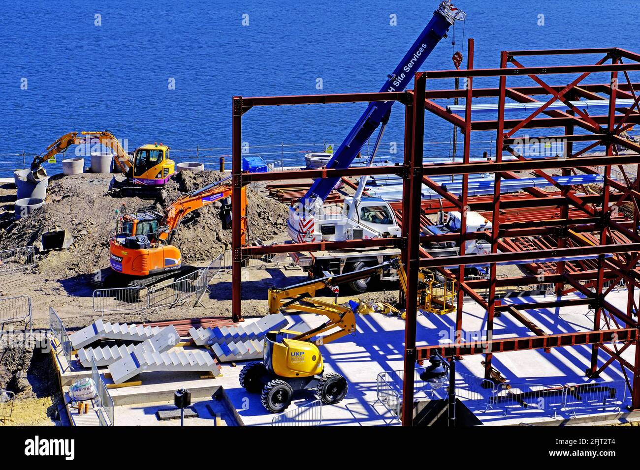 Steel framed 3 storey building being constructed by the riverside Stock ...