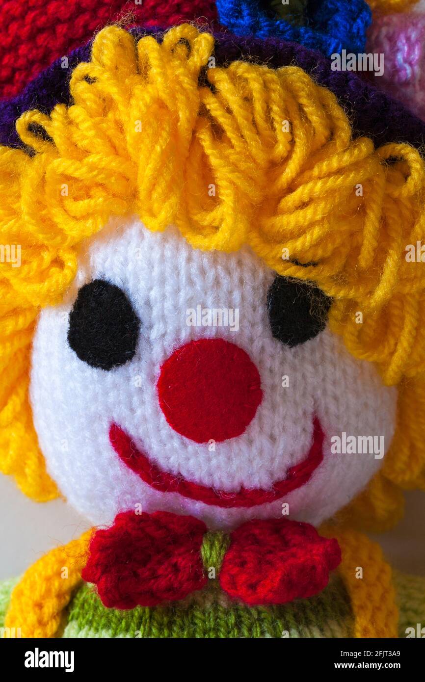 hand knitted clown showing face detail Stock Photo - Alamy