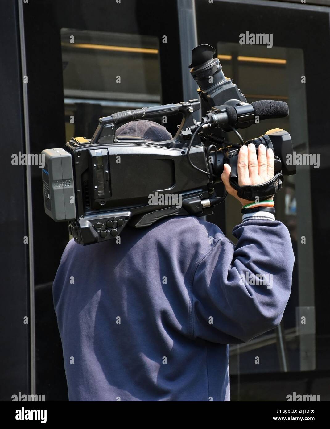 Cameraman in action on the street Stock Photo - Alamy