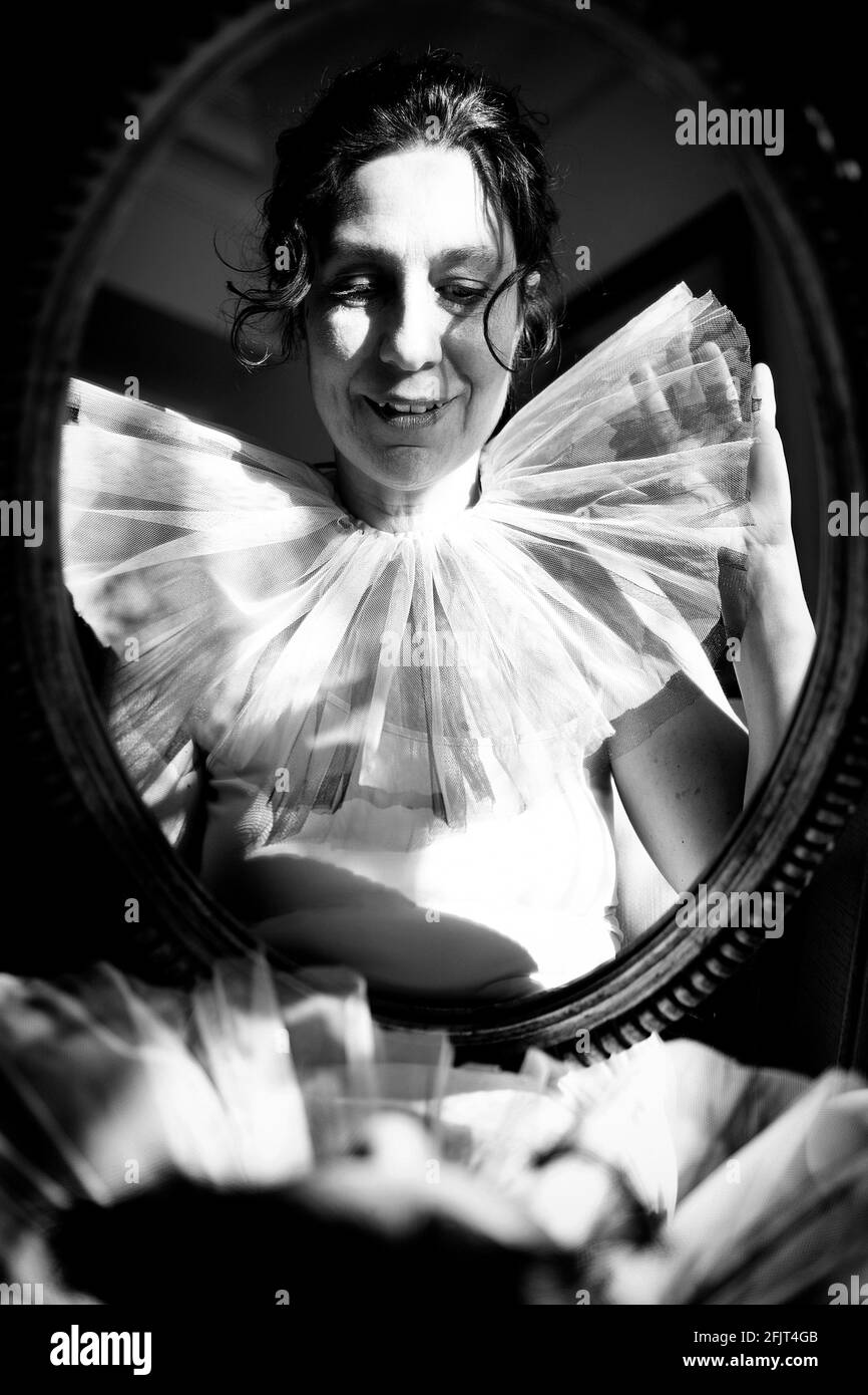 woman´s face reflected in a mirror II Stock Photo - Alamy