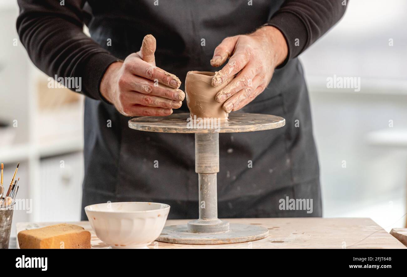Boy pottery wheel hi-res stock photography and images - Alamy