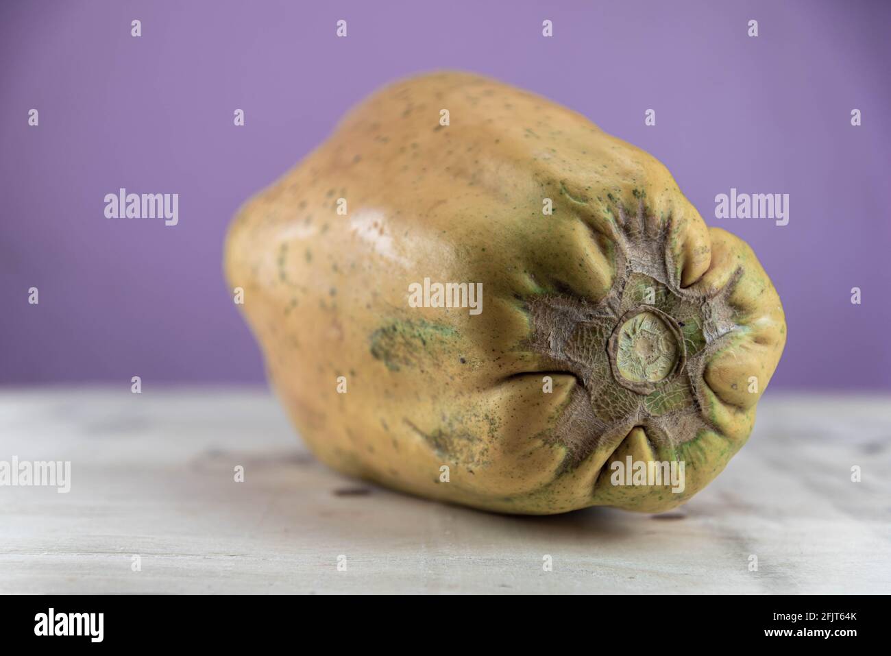 Formosa variety papaya fruit on wooden background. Papaya Formosa ...