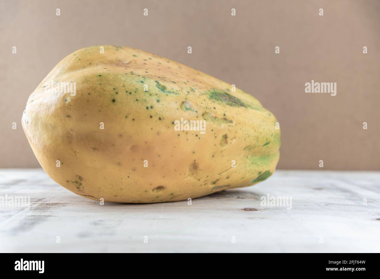 Formosa variety papaya fruit on wooden background. Papaya Formosa ...