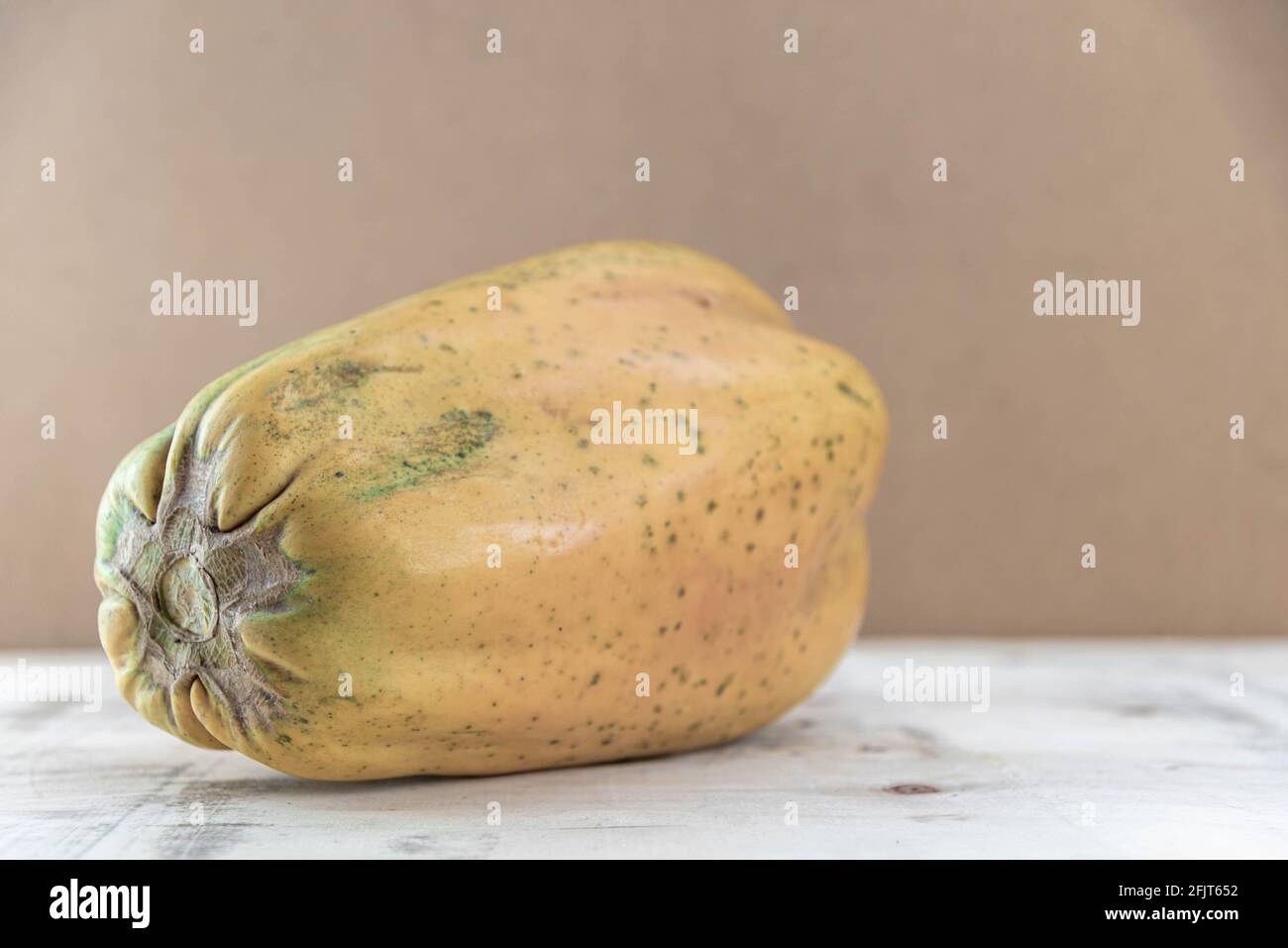 Formosa variety papaya fruit on wooden background. Papaya Formosa ...