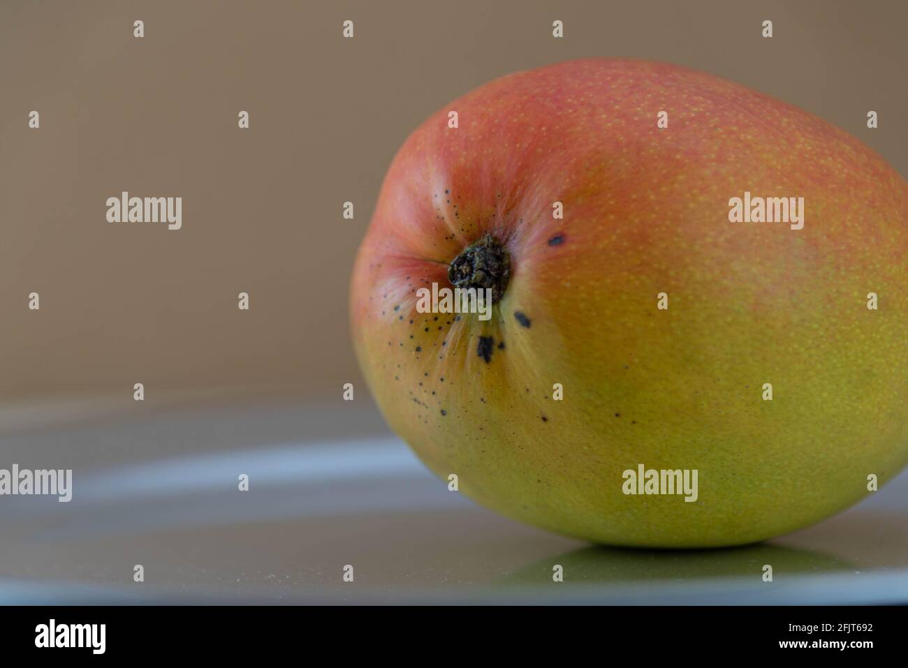 Fresh pink mango fruit. Sweet fruit from northeastern Brazil. Strains ...